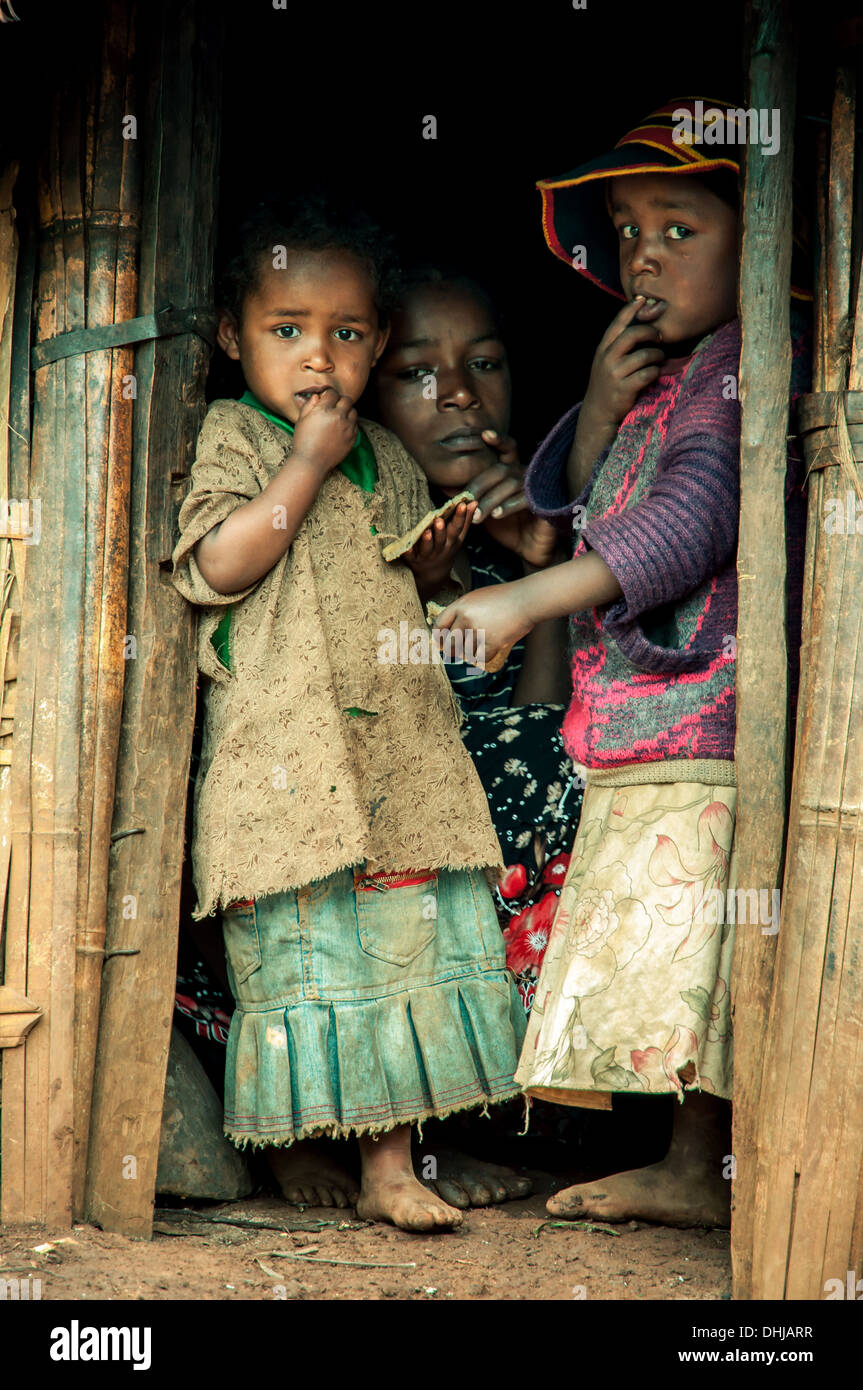 A member of the tribe poses to be taken a picture in Omo Valley ...
