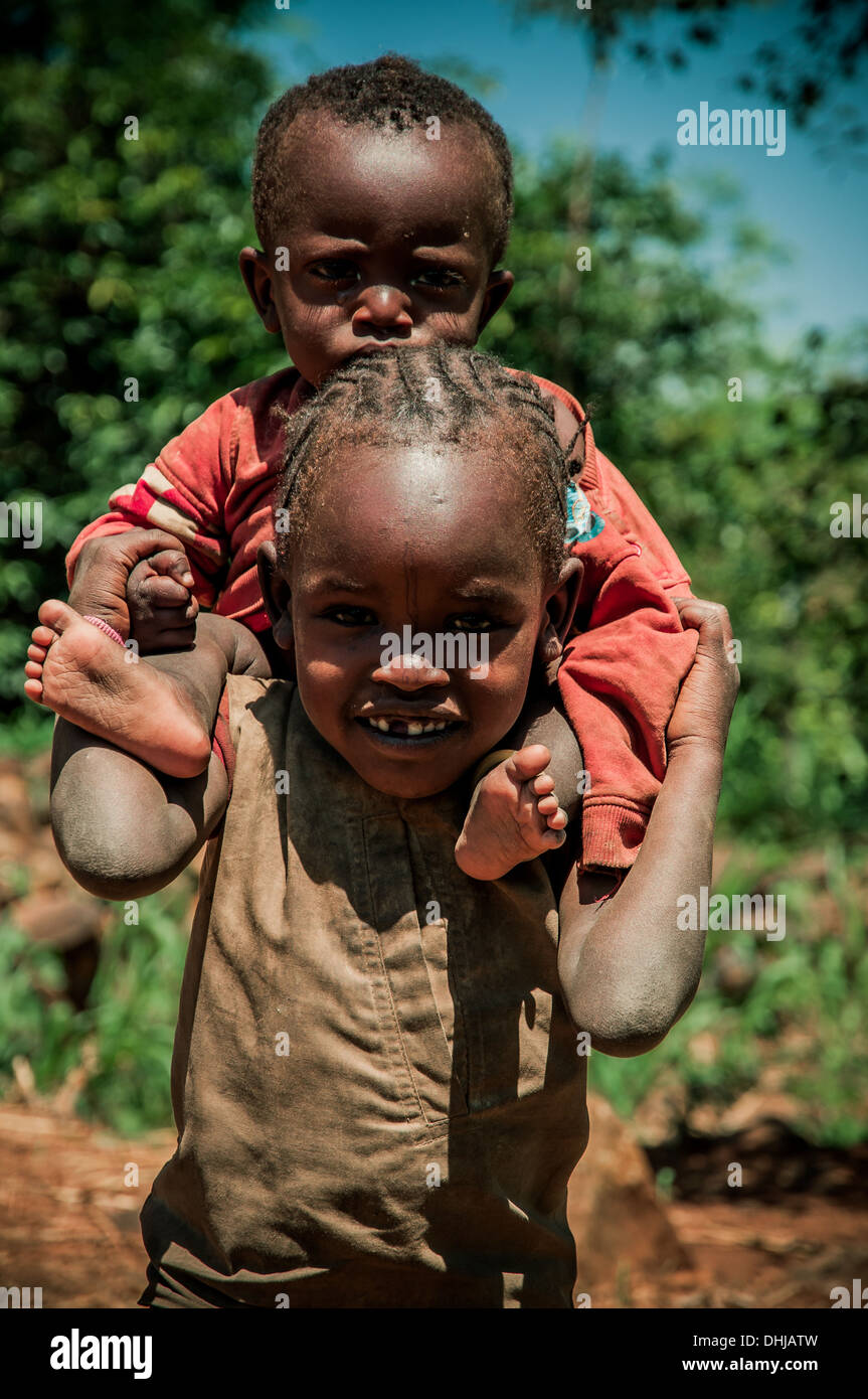 A member of the tribe poses to be taken a picture in Omo Valley ...