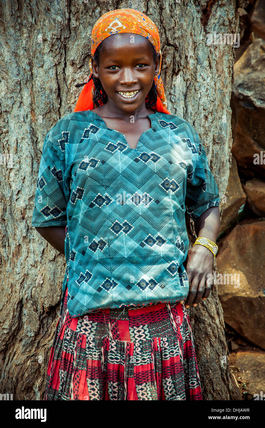 A member of the tribe poses to be taken a picture in Omo Valley ...