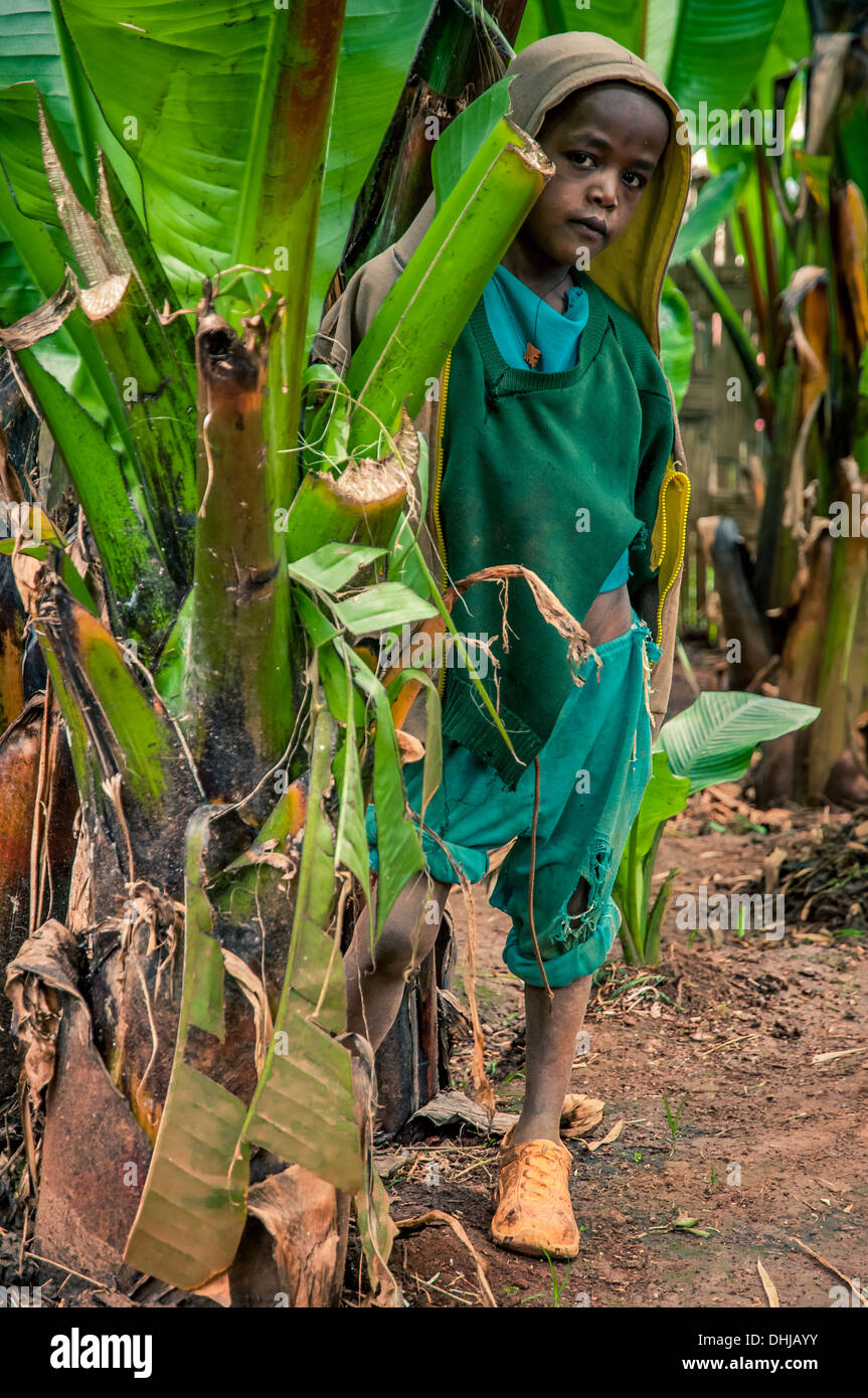 A member of the tribe poses to be taken a picture in Omo Valley ...