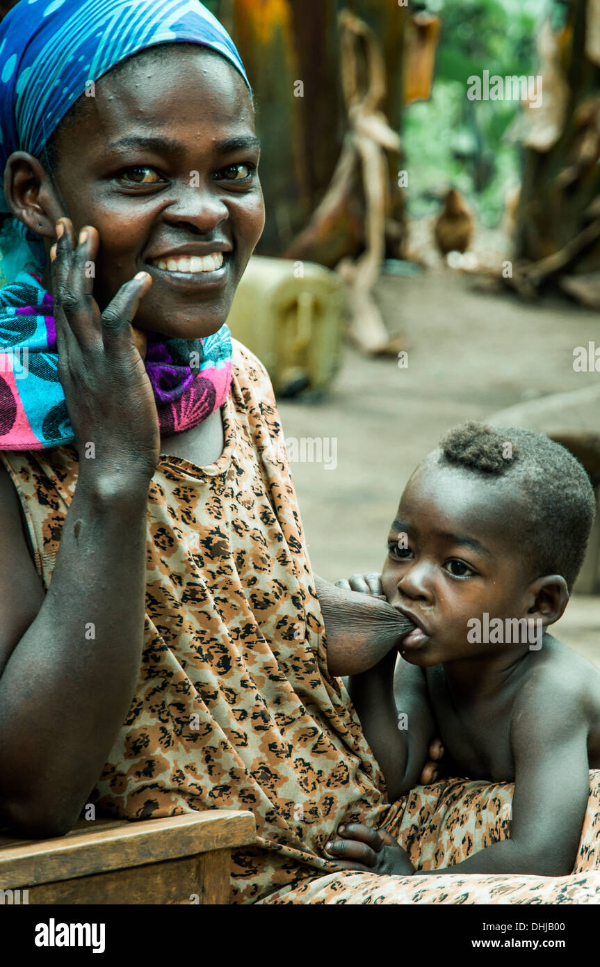 A member of the tribe poses to be taken a picture in Omo Valley ...