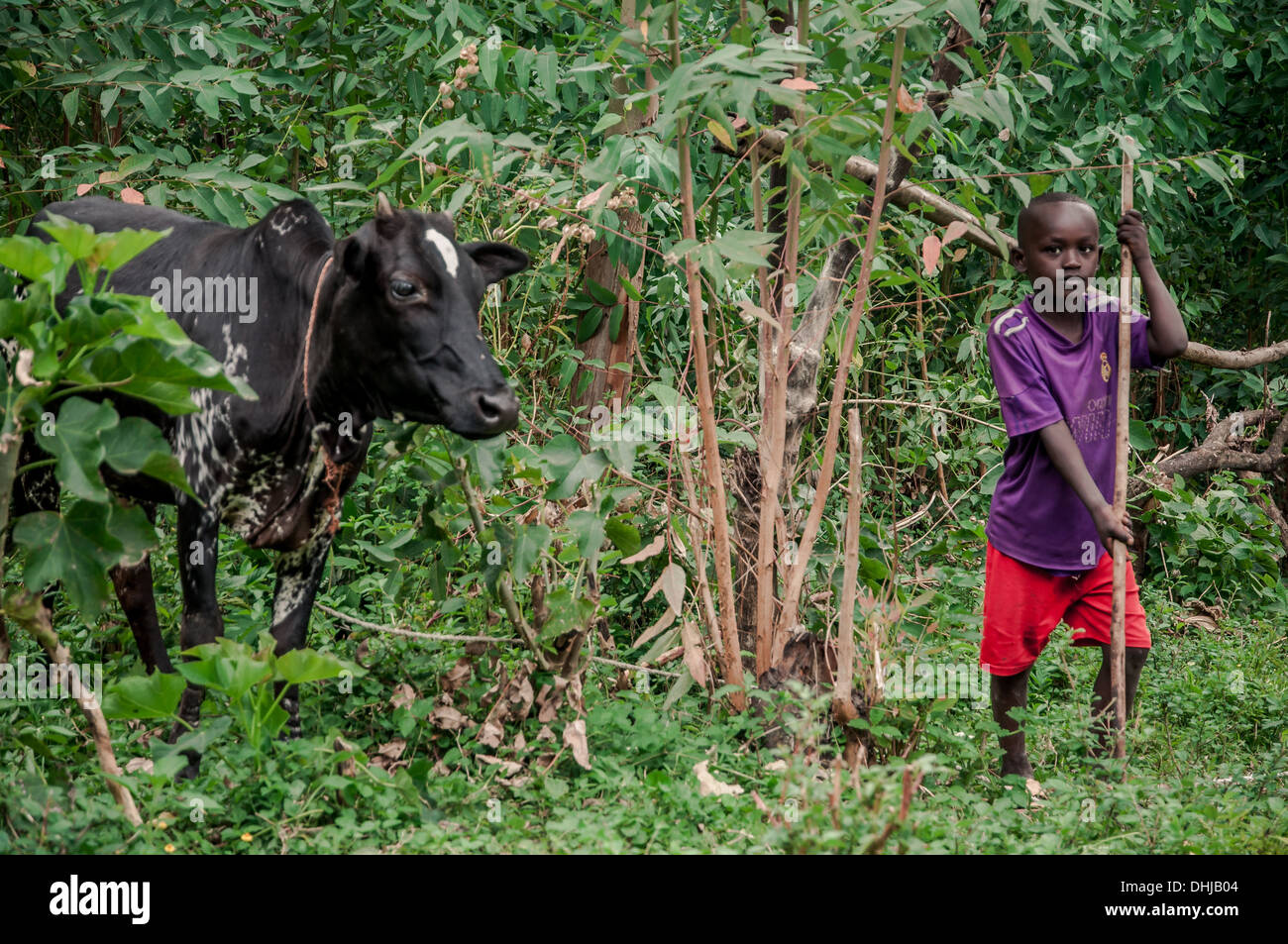 A member of the tribe poses to be taken a picture in Omo Valley ...