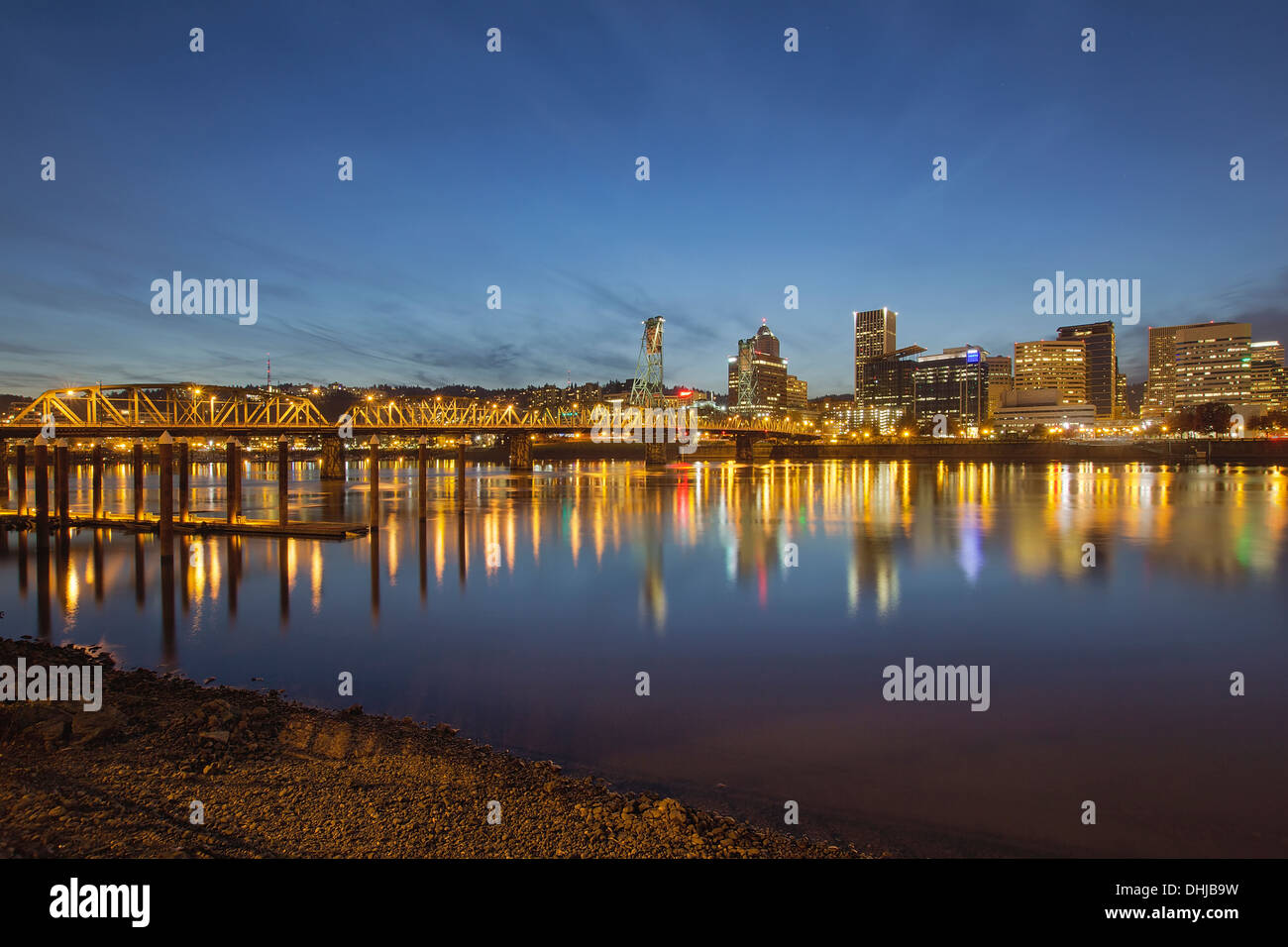 Portland Oregon Downtown Skyline with Hawthorne Bridge Along the Banks ...