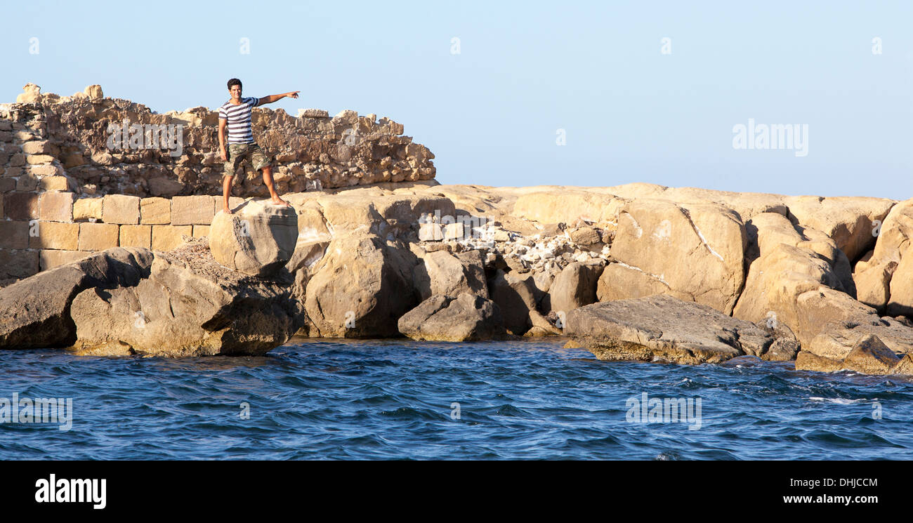 Man thinking on the rocks hi-res stock photography and images - Alamy
