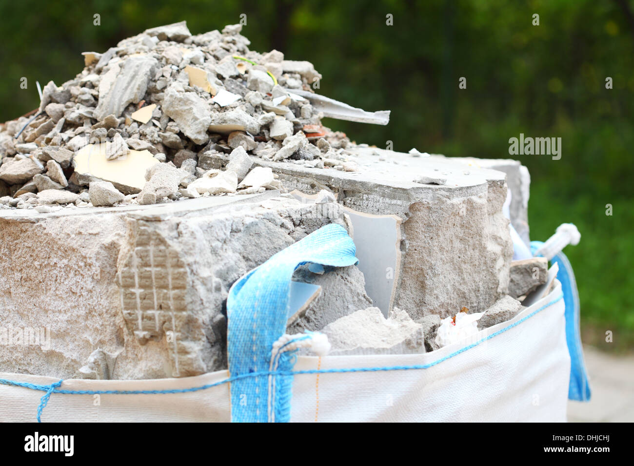 Full construction waste debris bags, garbage bricks, pile of rubble and ...