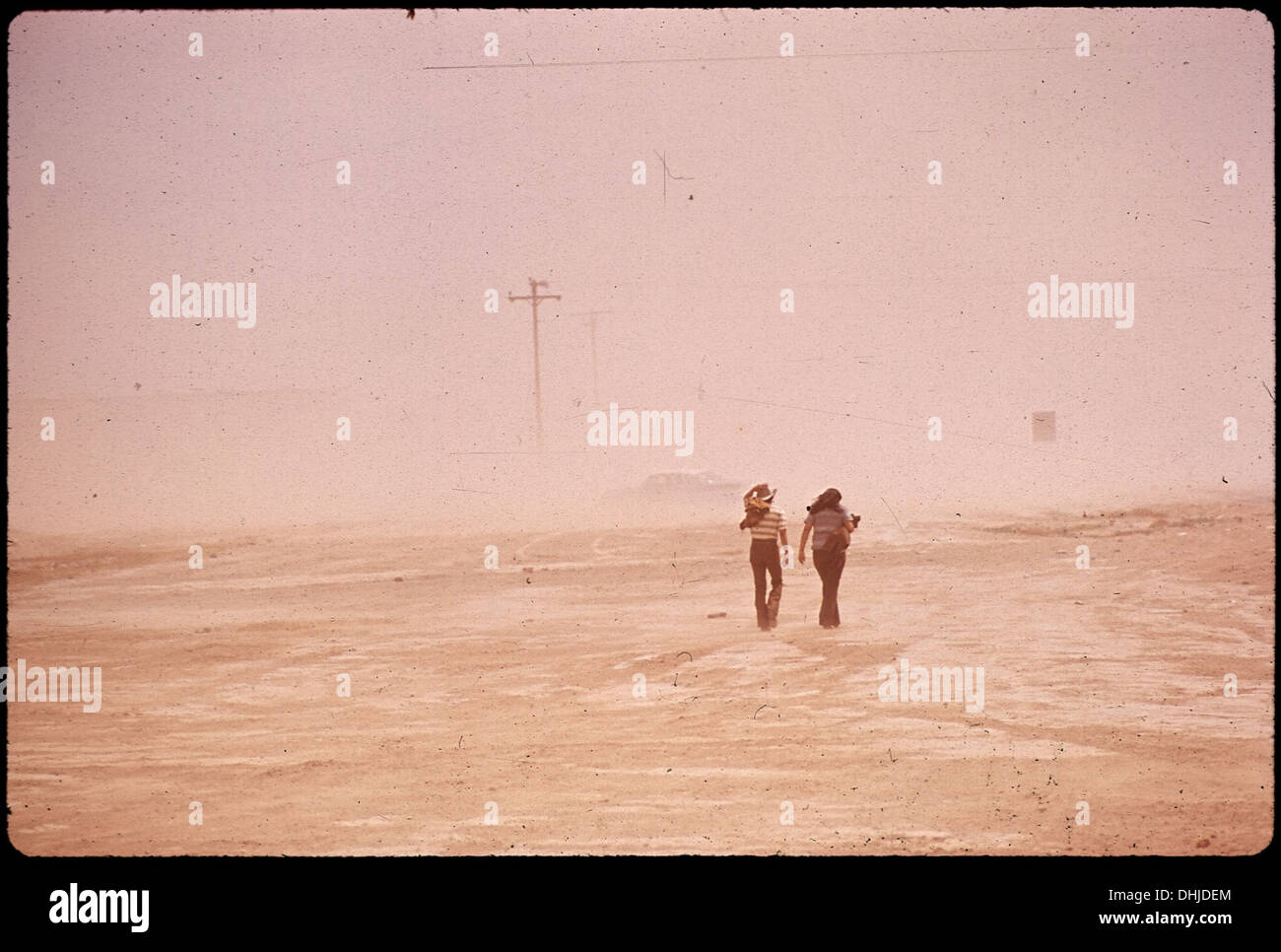 A photograph depicting a dust storm, illustrating the harsh ...