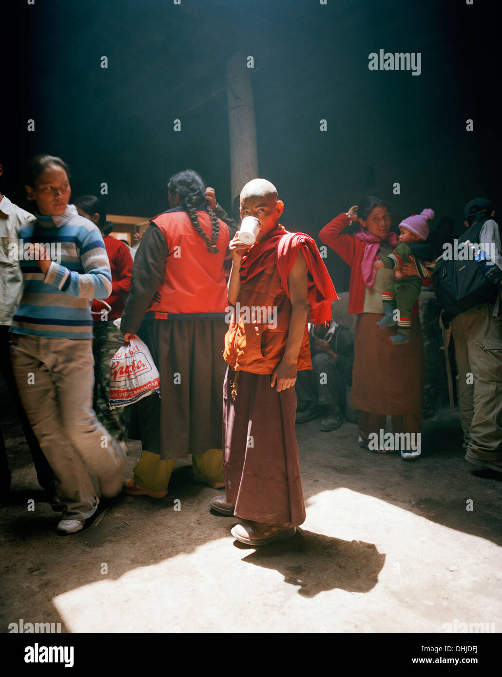 Monk drinking tea and visitors at the Hemis Festival at convent Hemis ...