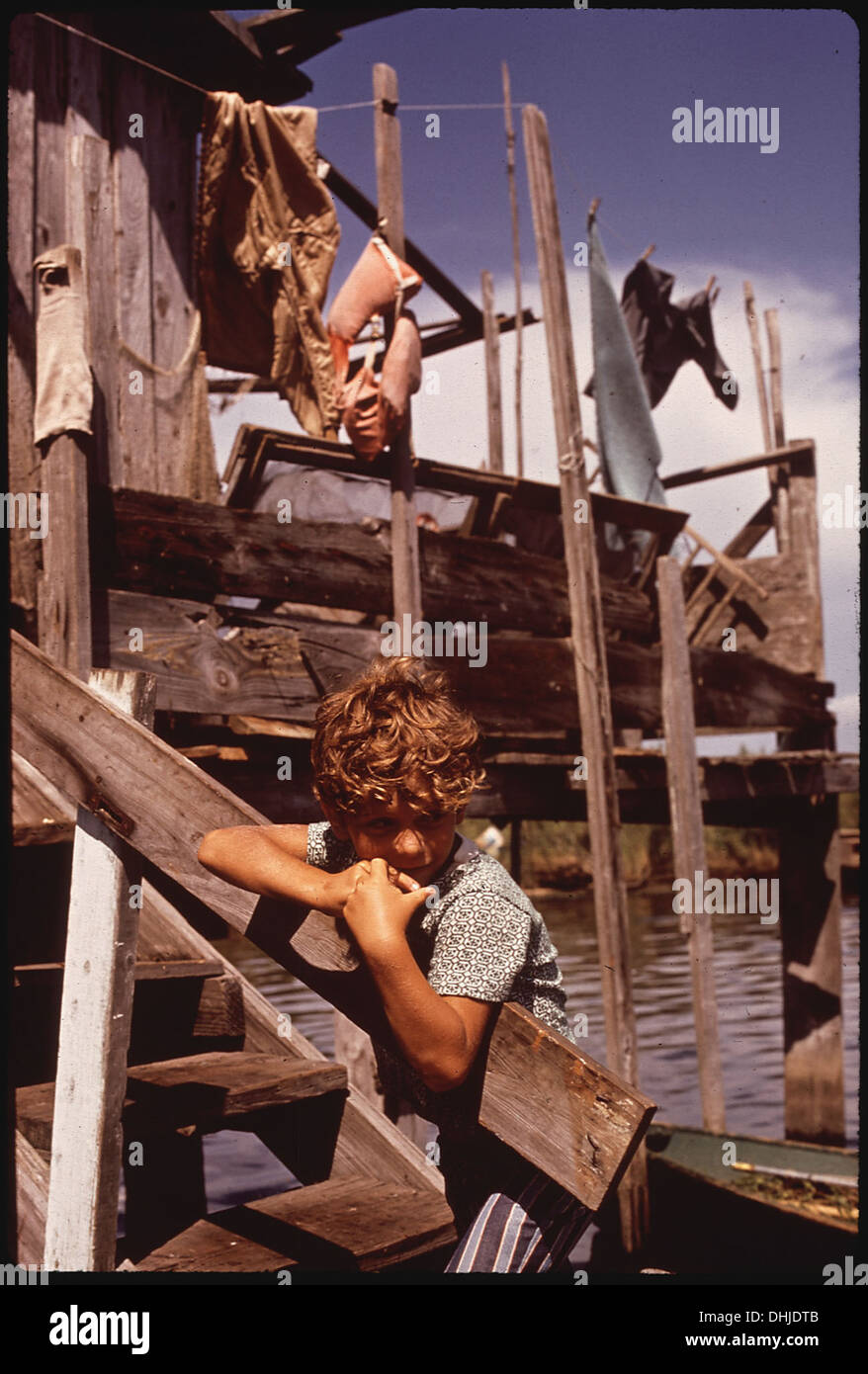 A portrait of a fisherman's son, capturing a glimpse into the life of a ...