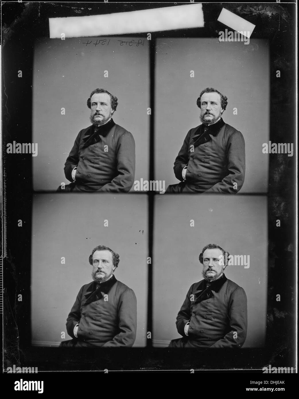 A distinguished gentleman, dressed in formal attire, exudes elegance ...