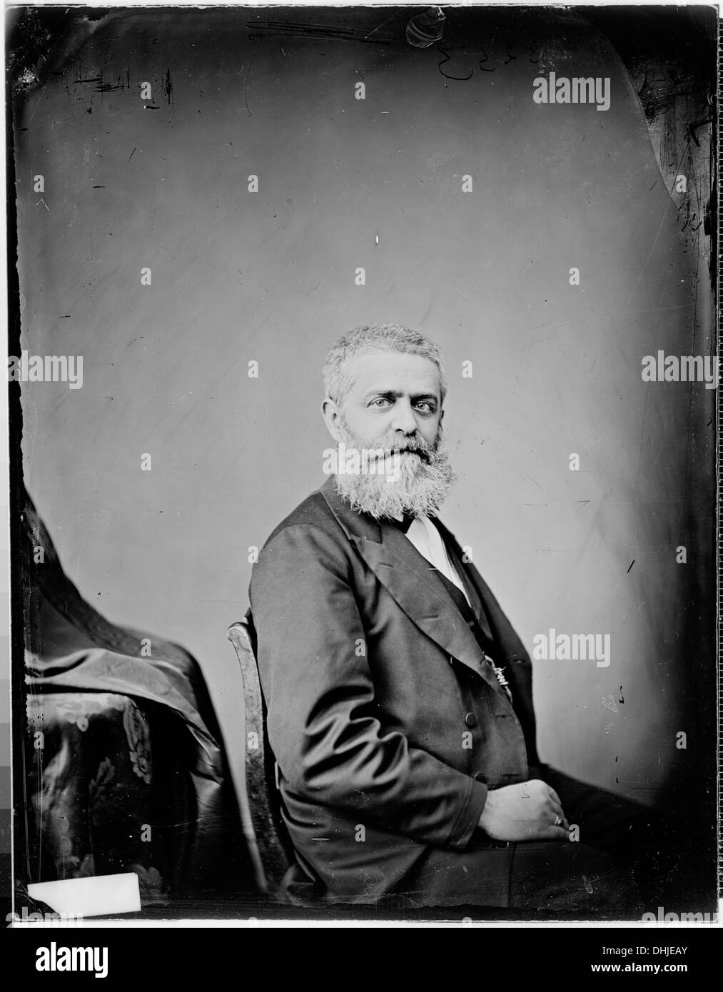 The image titled 'Gentleman' captures a man dressed in formal attire ...