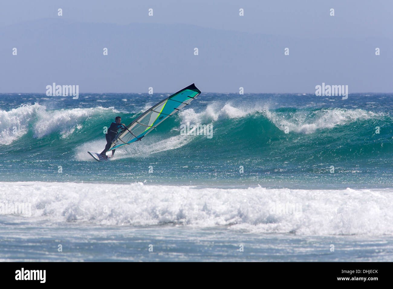 windsurfer surfing a wave in Tarifa Stock Photo - Alamy