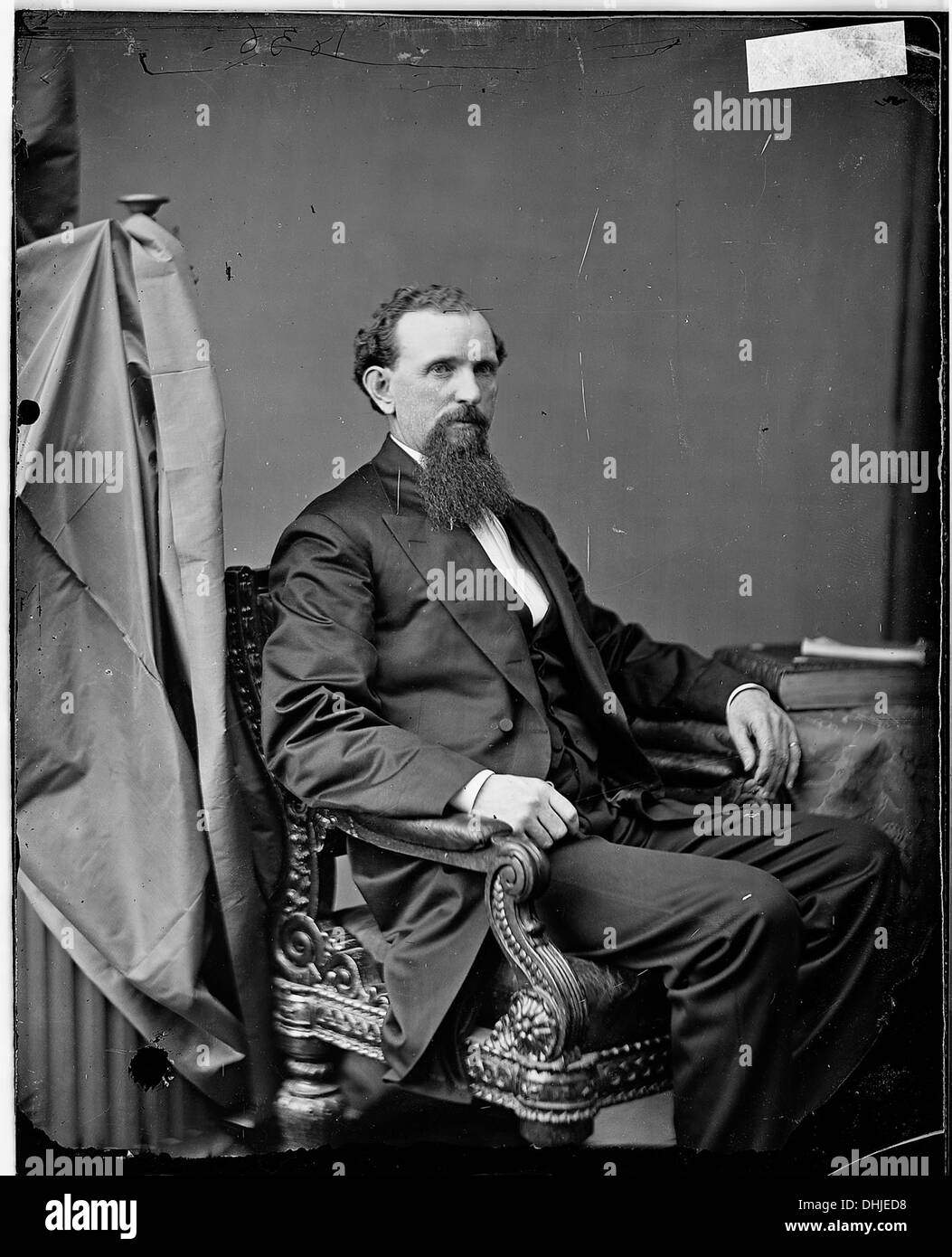 A portrait of a well-dressed gentleman, showcasing a formal and ...