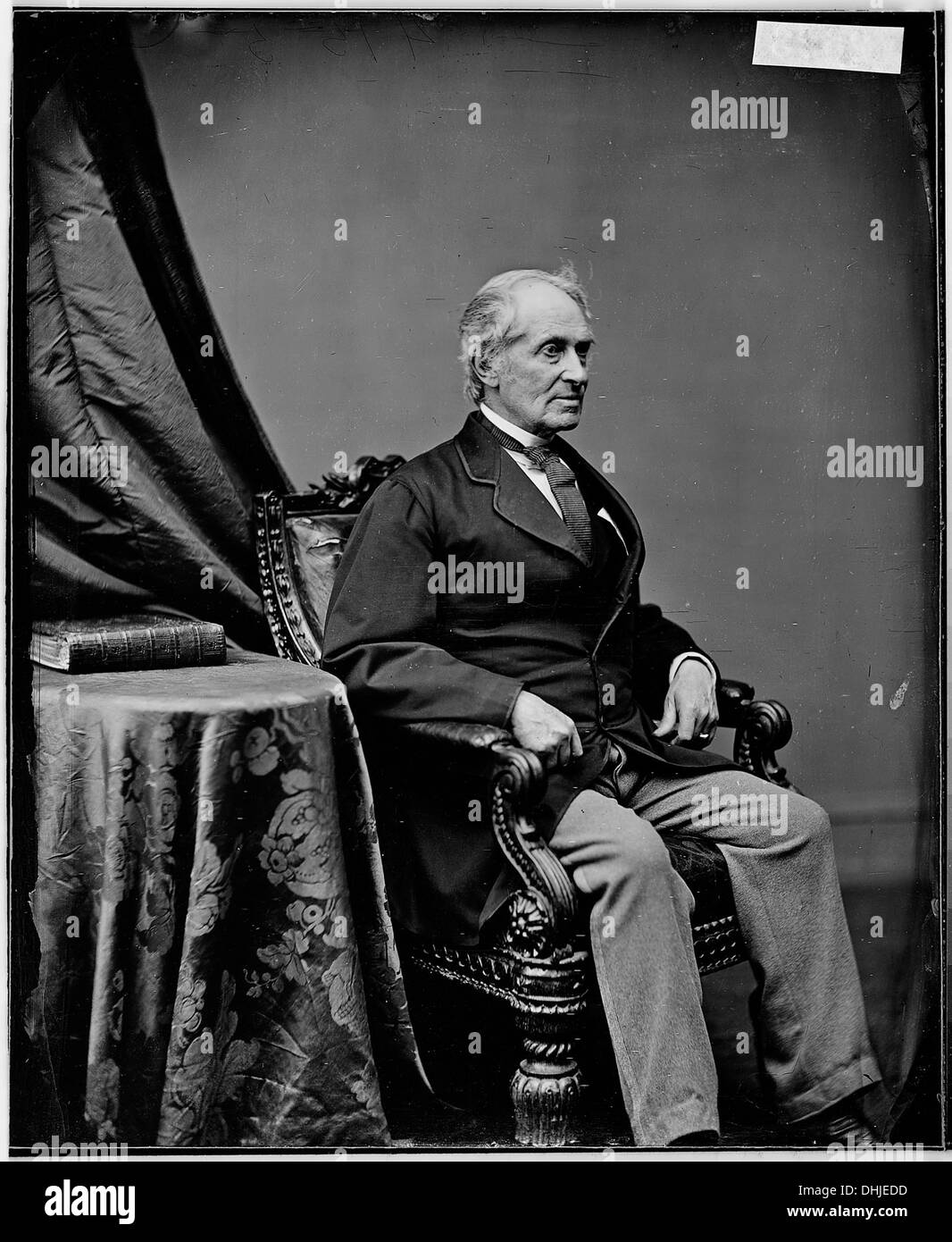 A portrait of a gentleman, capturing the formal attire and posture ...