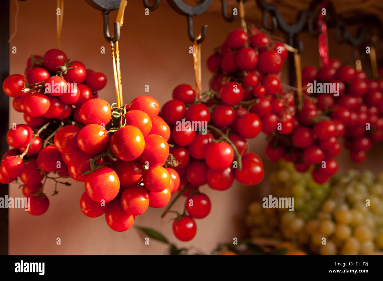 Tomatoes cluster hinging snack food positano italy hi-res stock ...