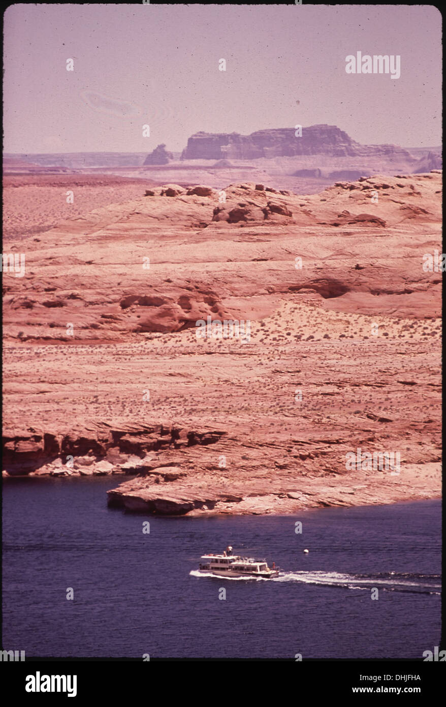 This photograph captures the expansive and scenic Lake Powell, located ...