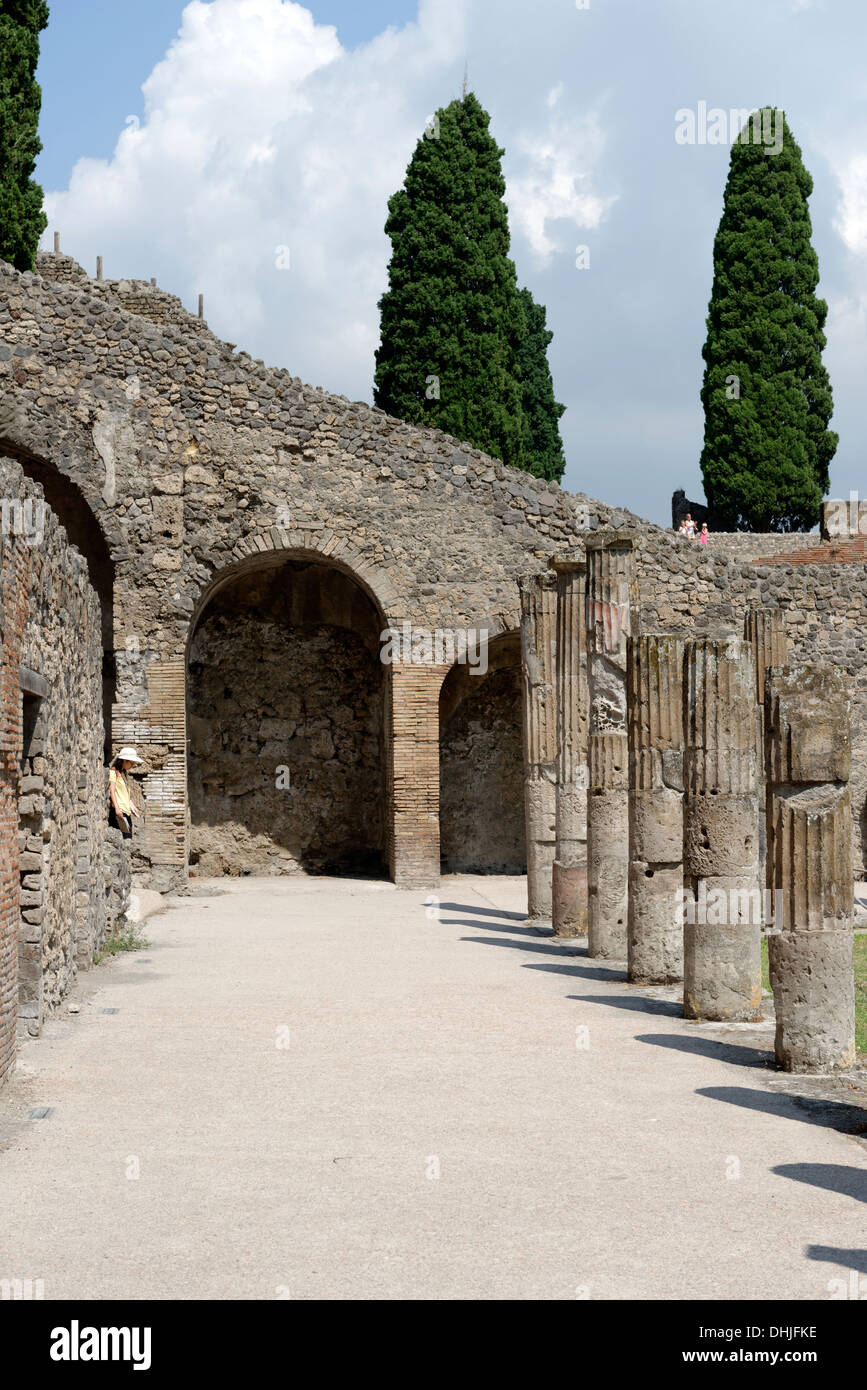 The Arcaded Court of the Gladiators at Pompeii Italy. During the time ...