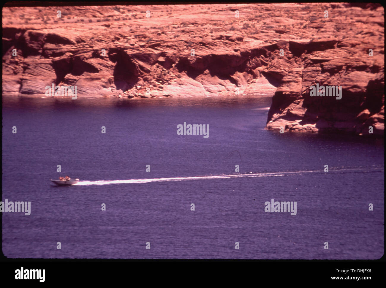 A photograph depicting motorboating on Lake Powell, a popular ...