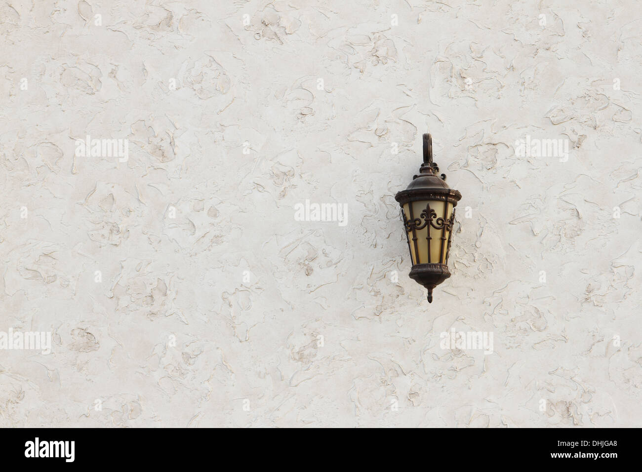 golden wall lamp with background Stock Photo - Alamy