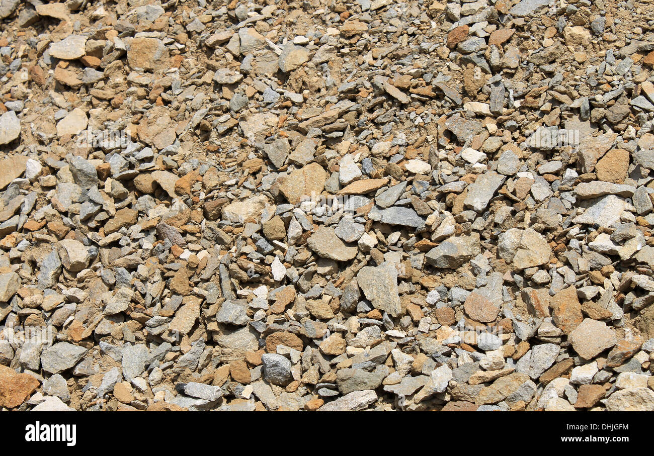 Abstract background of pile of brown rocks Stock Photo - Alamy