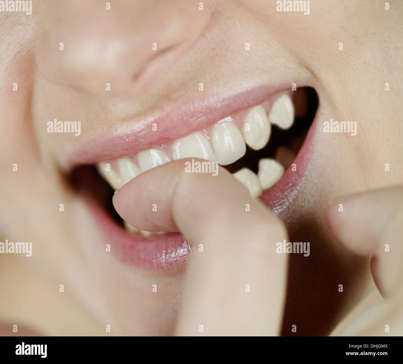 One woman biting nails nervous hi-res stock photography and images - Alamy