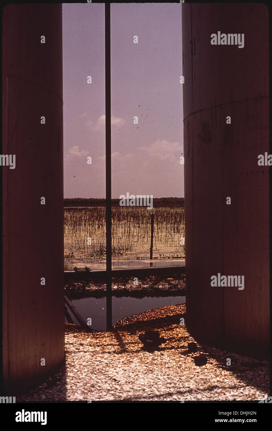 This image shows a tank battery owned by Emerald Oil Company, an ...