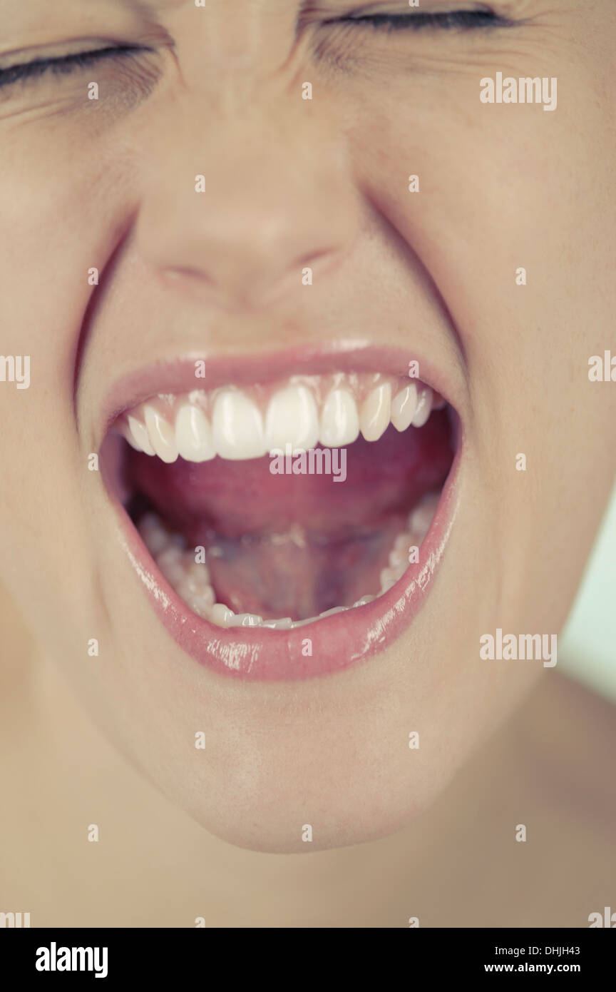 A young woman screaming Stock Photo - Alamy