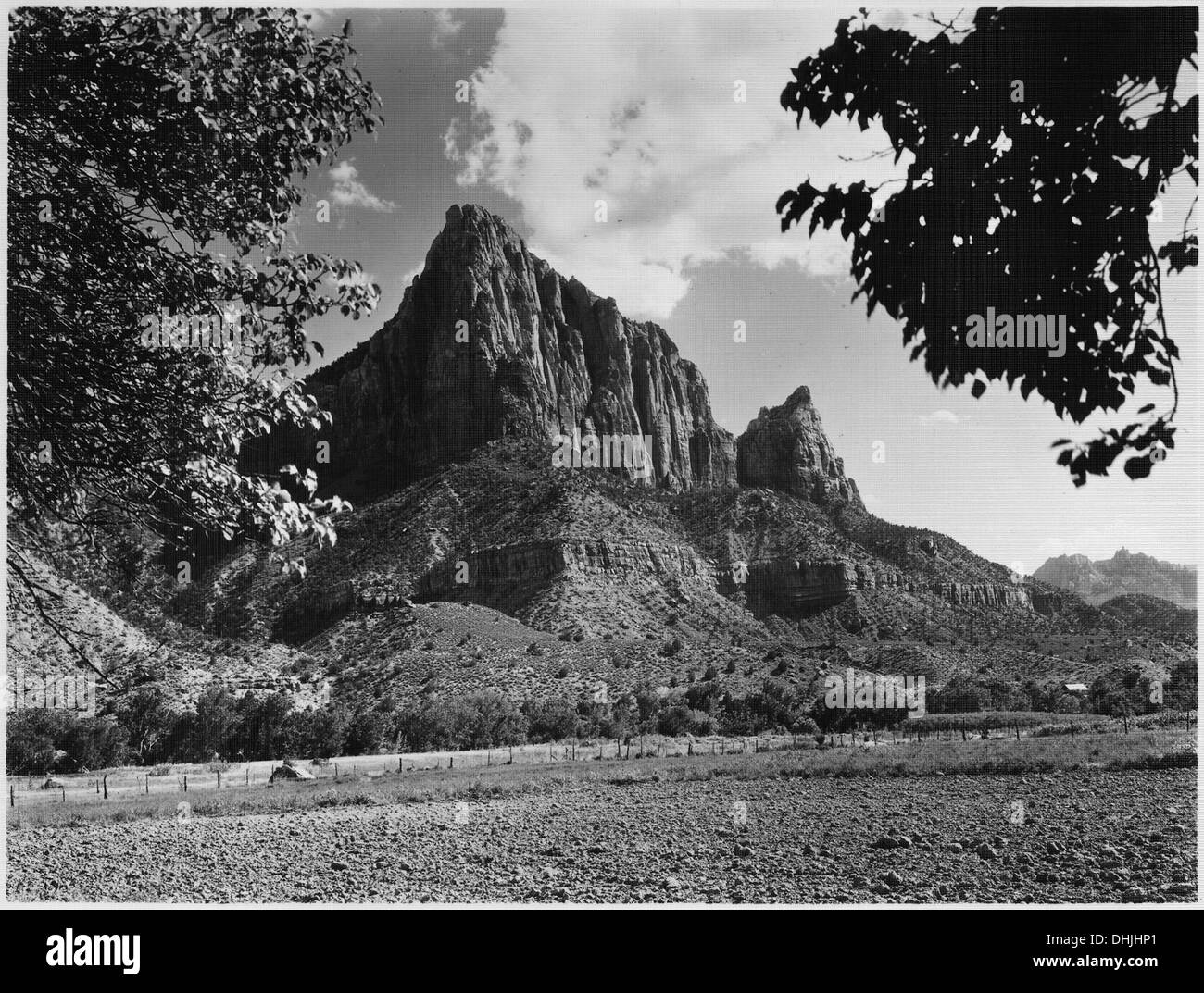 This photograph, titled 'The Watchman,' features a figure or monument ...