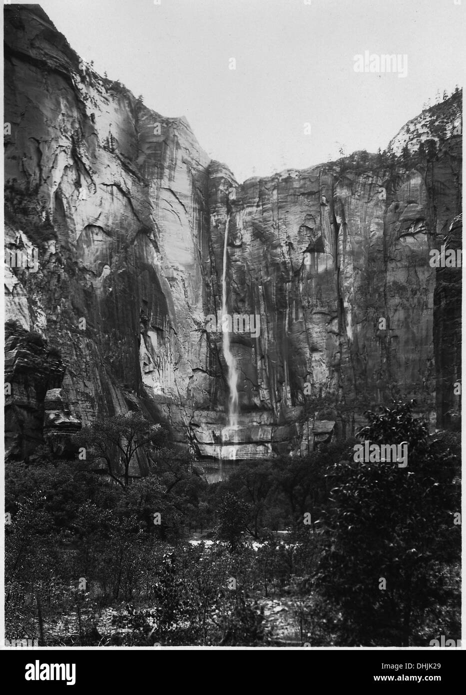 A waterfall cascades from a hanging valley in the Temple of Sinawava ...