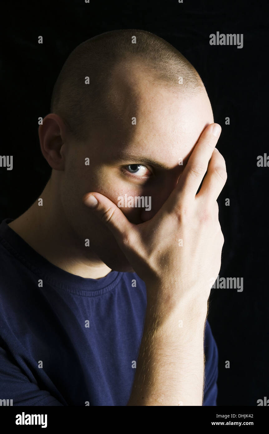 hand at forehead 1 Stock Photo - Alamy