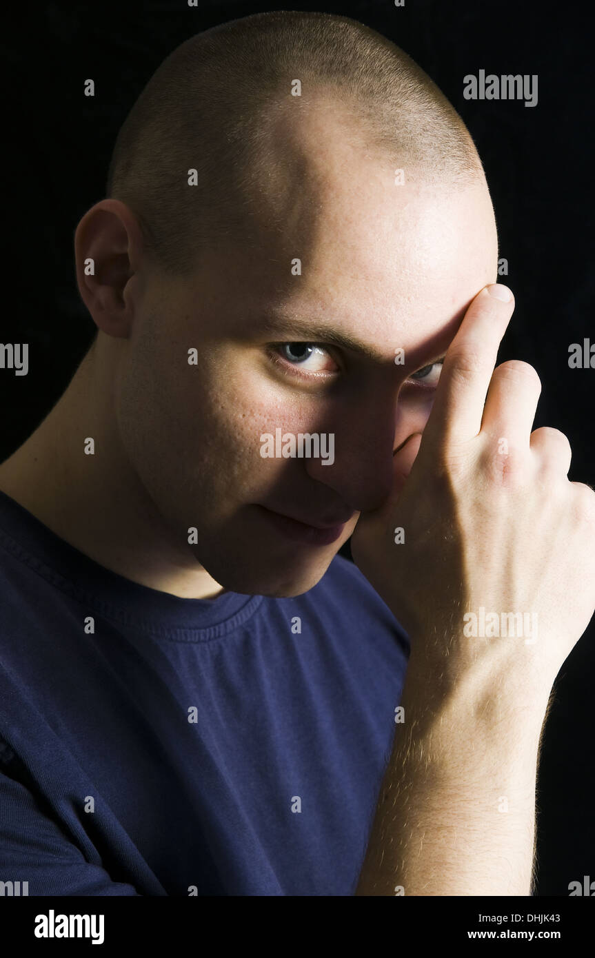 hand at forehead 2 Stock Photo - Alamy