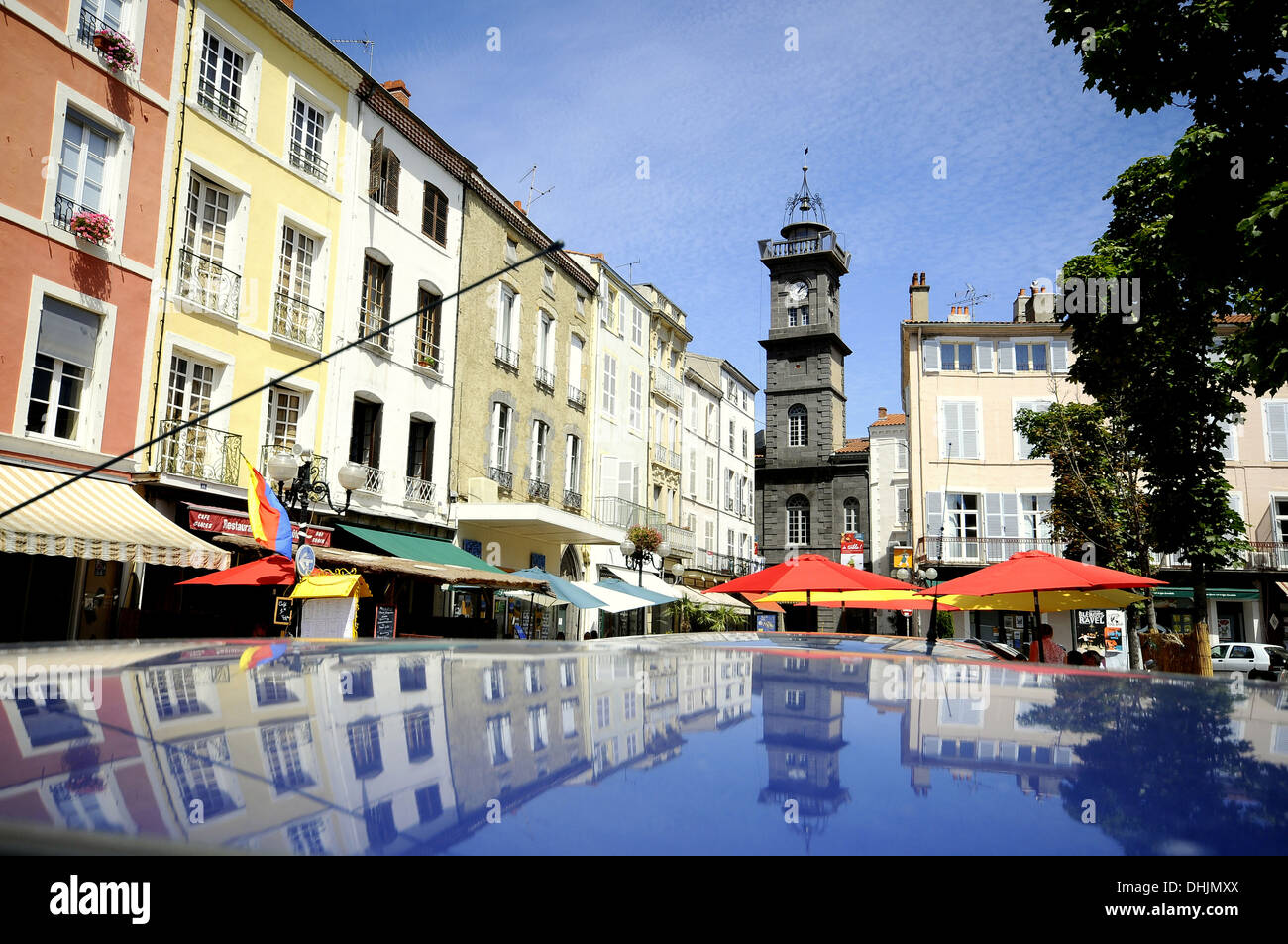 Houses and clock tower at Place de la Republique, Issoire, Auvergne ...