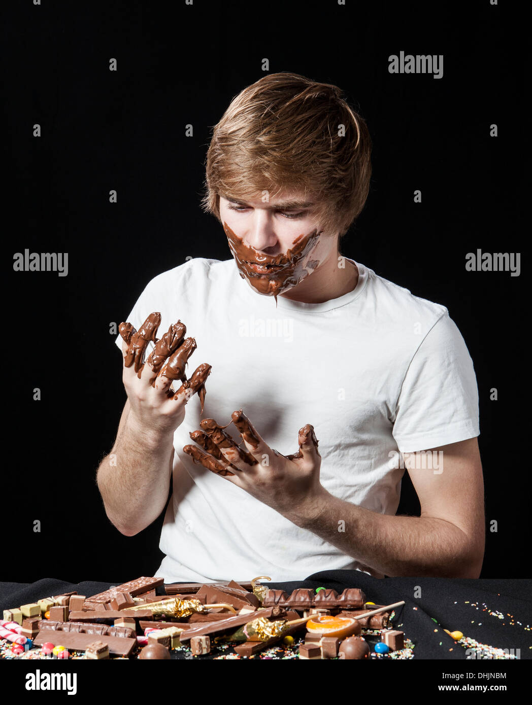 Chocolate messy eating teenager hi-res stock photography and images - Alamy