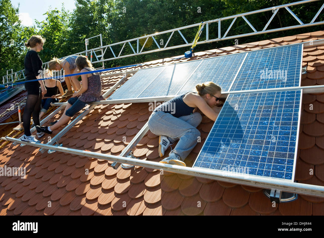 School project, students installing a solar plant, Freiburg im Breisgau ...