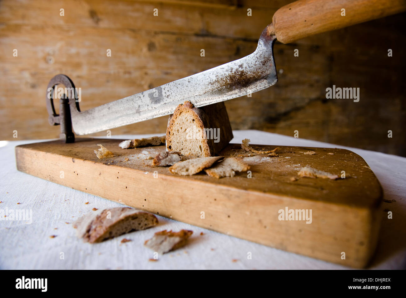 Old bread on a bread slicing machine, baking, homemade Stock Photo - Alamy