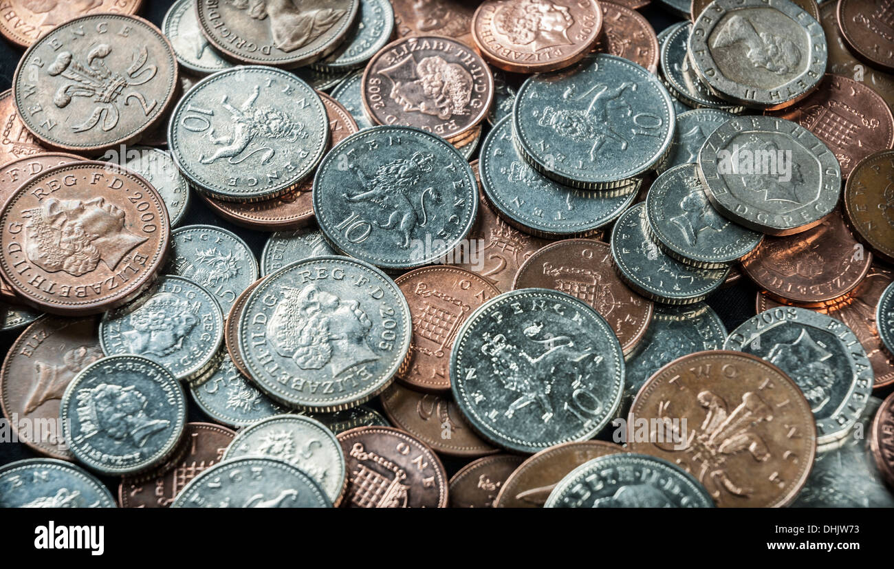 A mixture of UK coins background Stock Photo - Alamy
