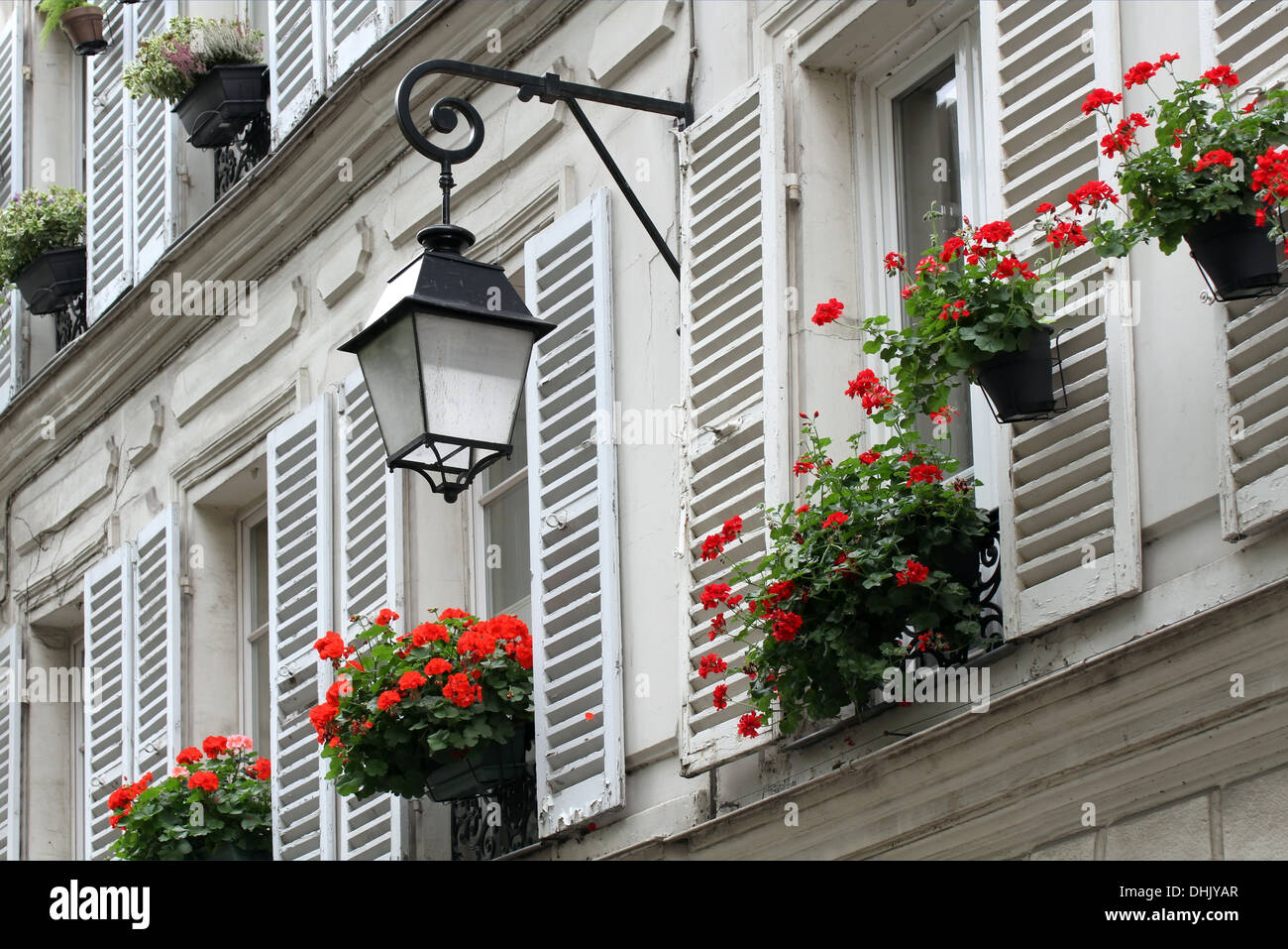 Windows with shutters of old buildings on Montmartre, Paris Stock Photo ...