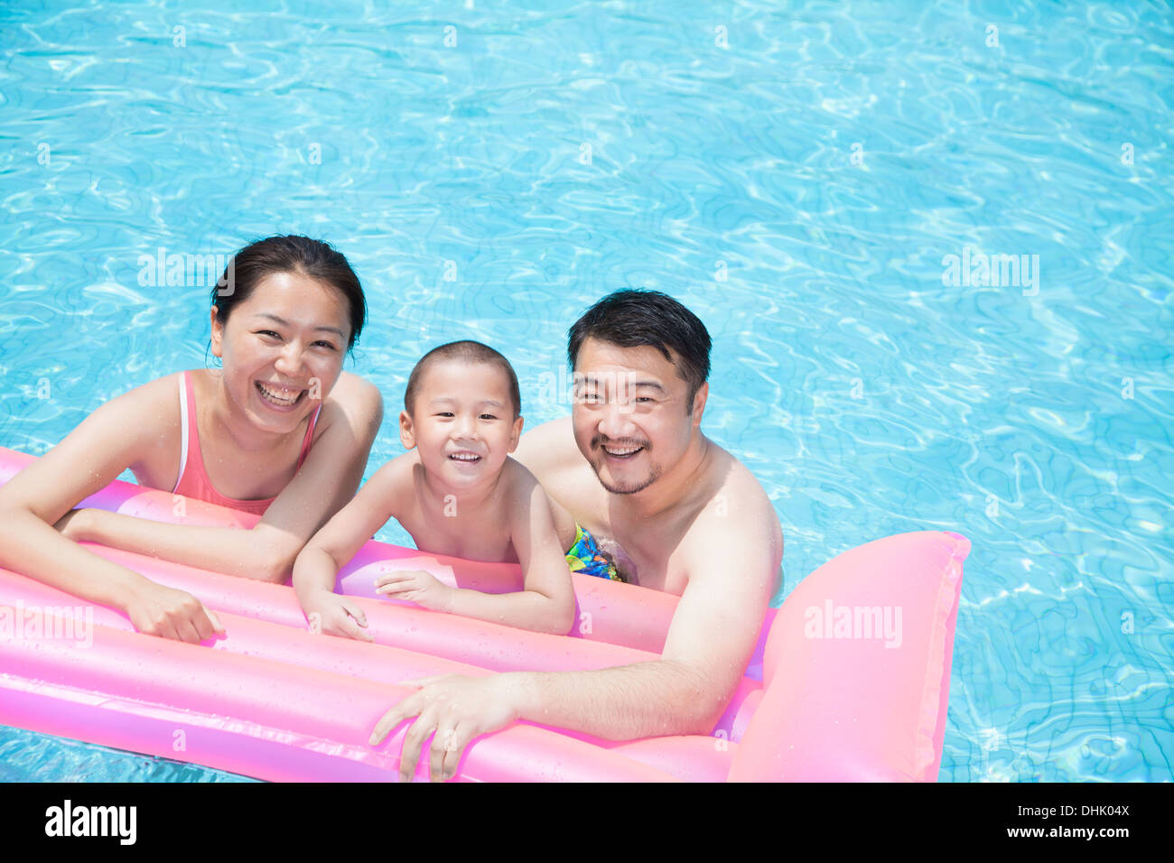 Father with his son in a swimming pool hi-res stock photography and ...