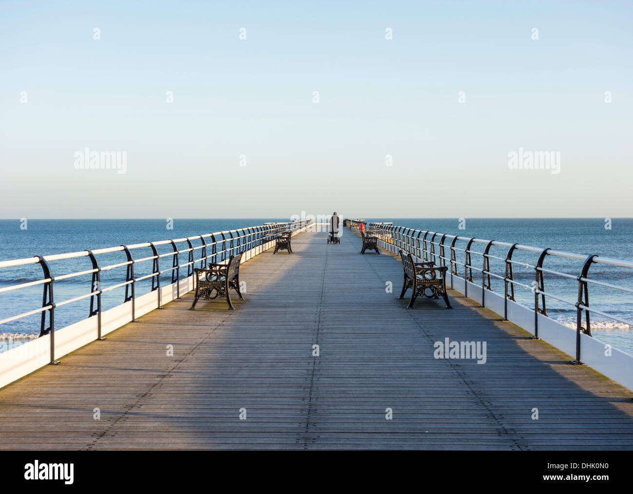 Man pushing pram on beach hi-res stock photography and images - Alamy