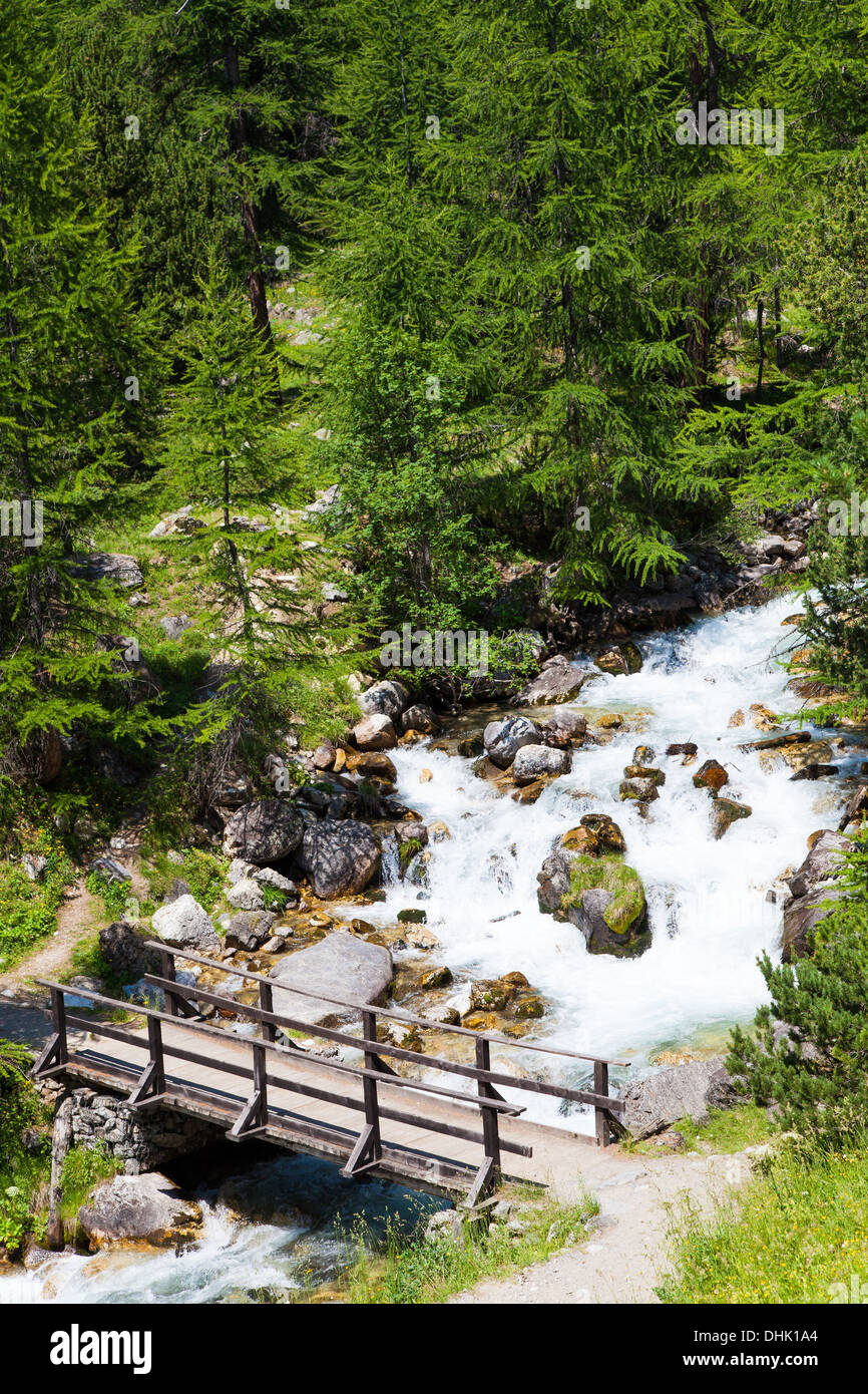 Bridge on mountain river Stock Photo - Alamy