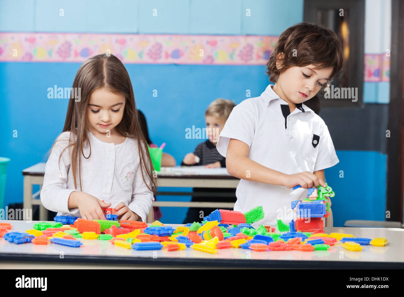Children Playing With Construction Blocks Stock Photo - Alamy
