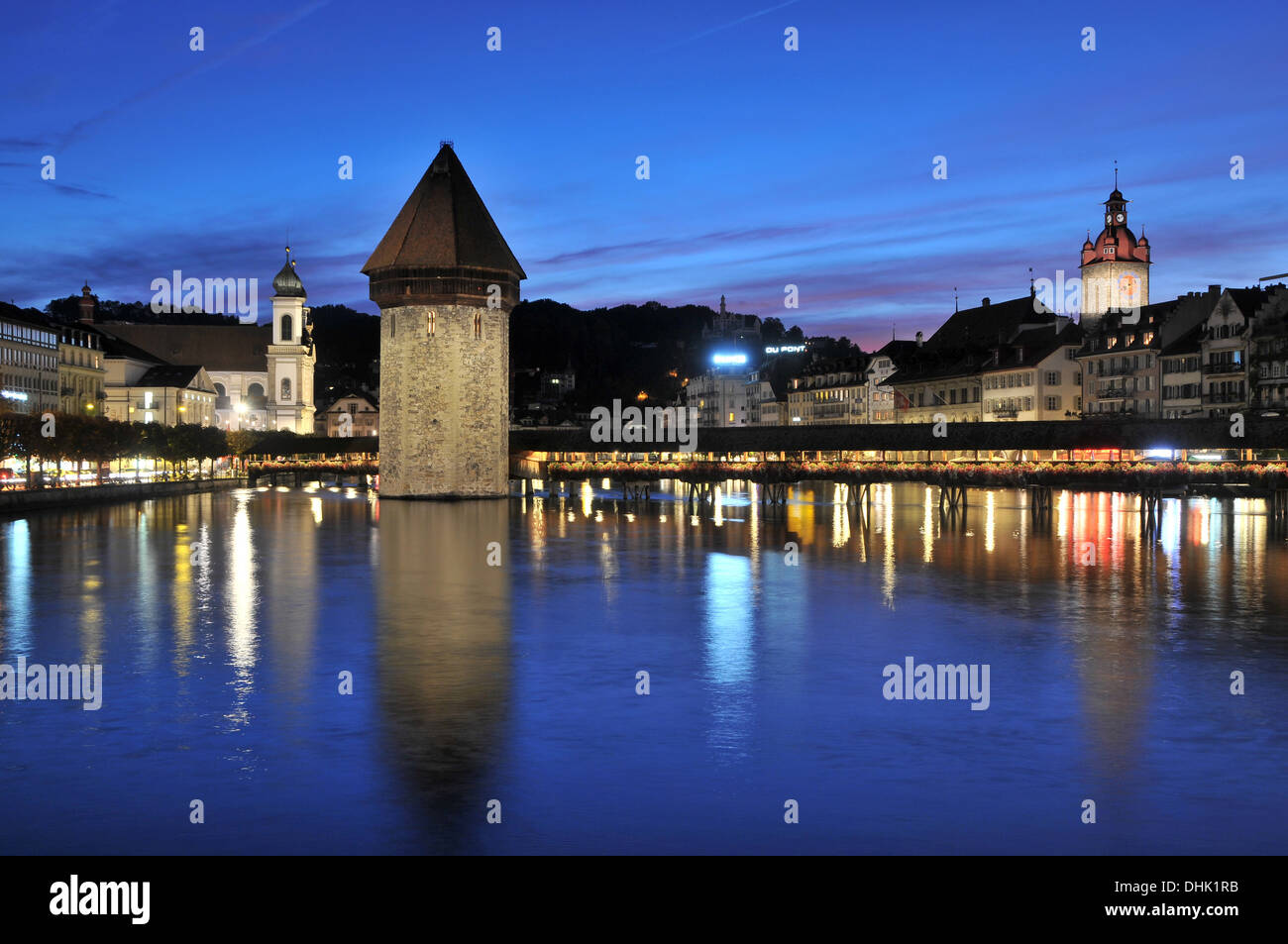 Illuminated Kapellbruecke bridge in the evening, Luzern, Switzerland ...