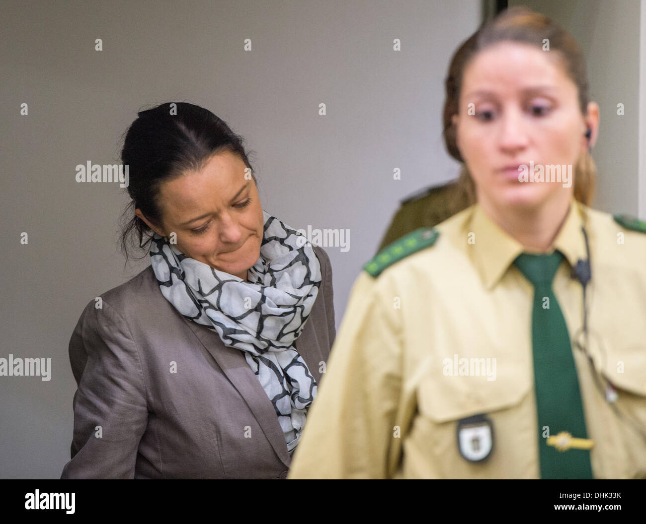 Munich, Germany. 12th Nov, 2013. Defendant Beate Zschaepe (L) appears ...