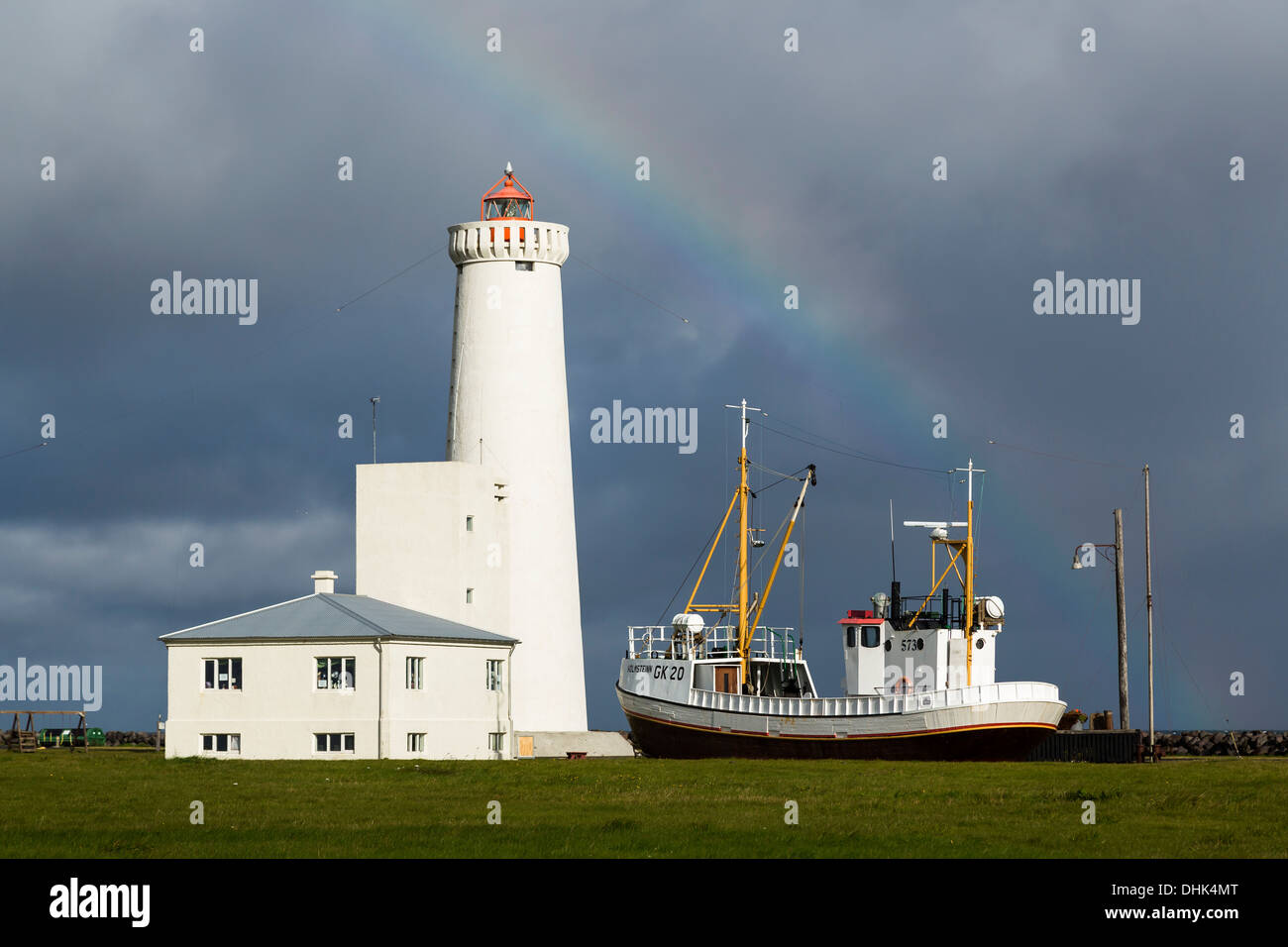 Iceland, Gardur, Coastline with ship and lighthouse Stock Photo - Alamy