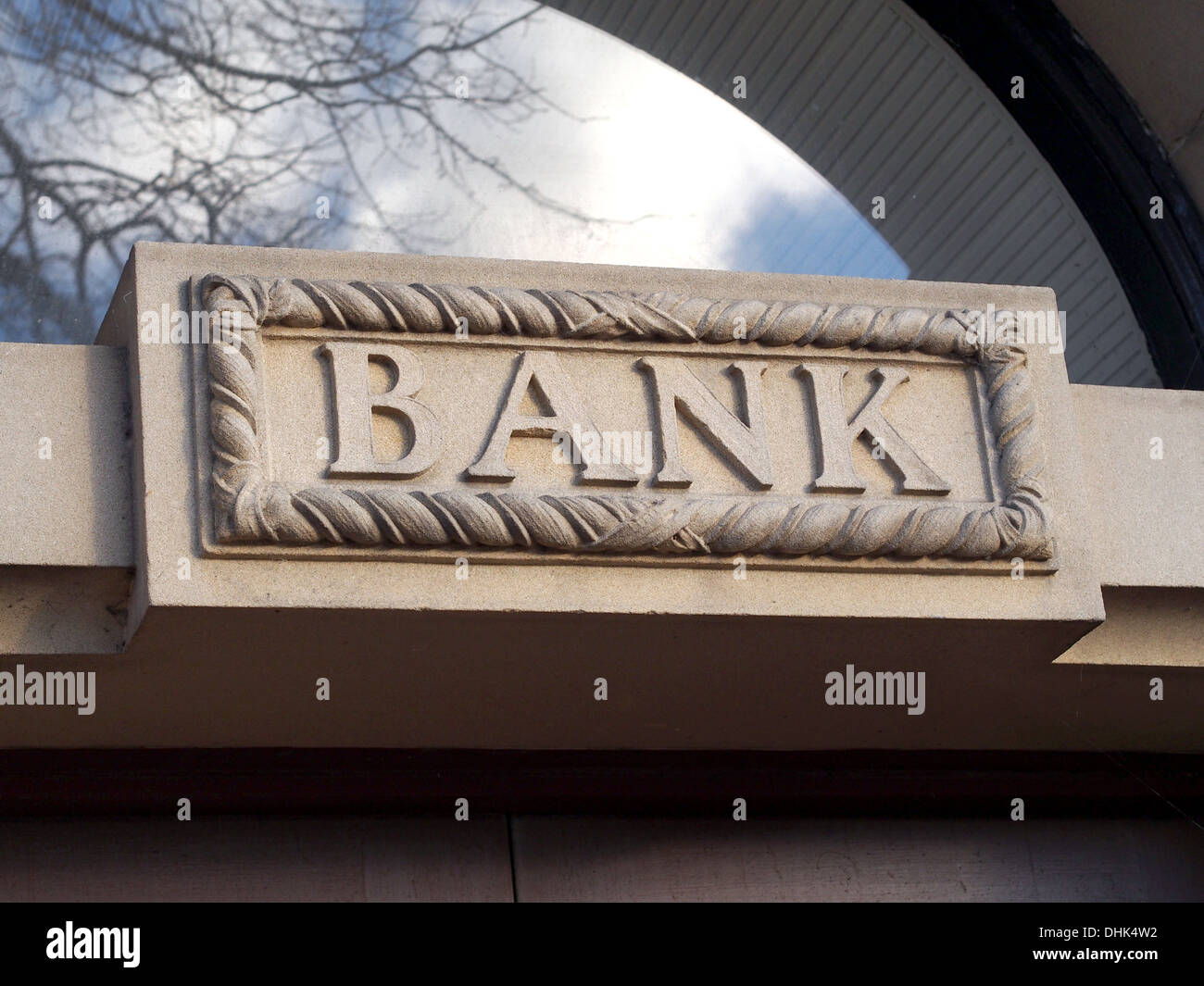 Bank sign carved in stone Stock Photo - Alamy