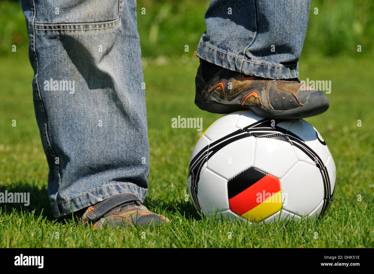 Germany, a boy's foot on a football Stock Photo - Alamy