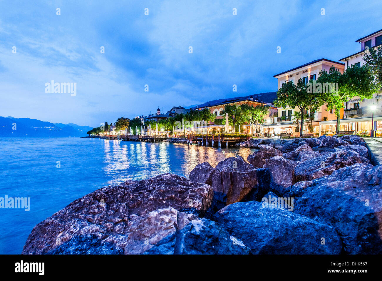 Lake promenade of Torri del Benaco in the evening light, Lago di Garda ...