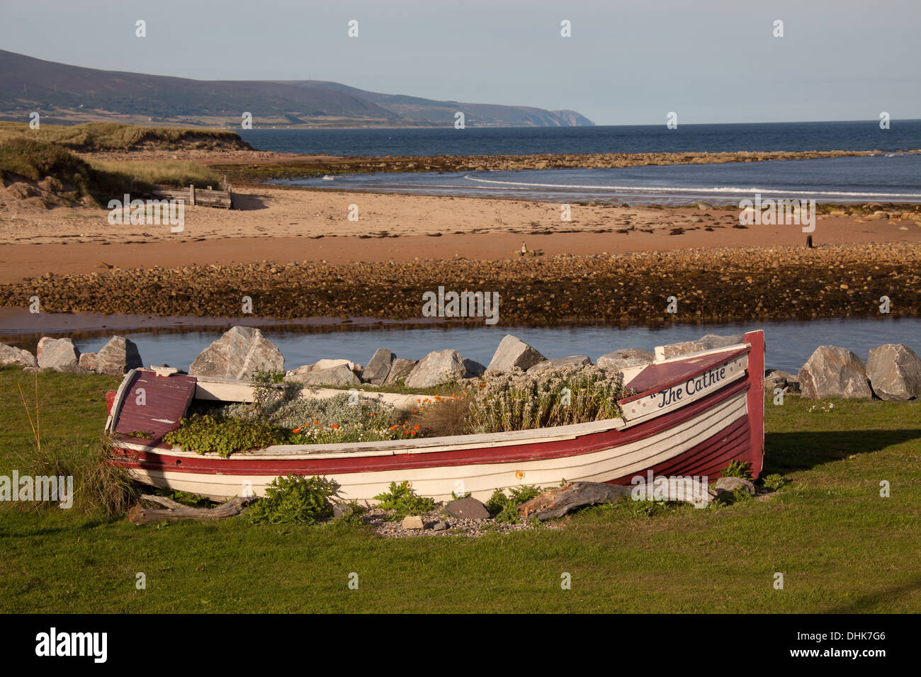Village of Brora, Scotland. Picturesque view of an old boat on the ...