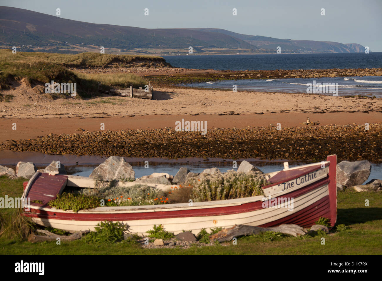 Village of Brora, Scotland. Picturesque view of an old boat on the ...
