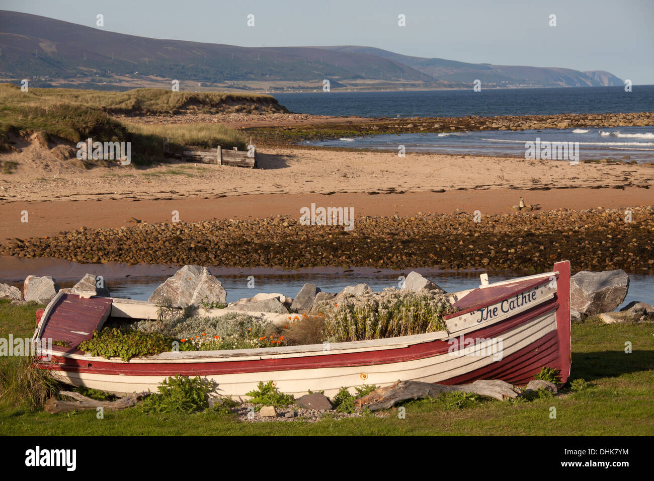 Village of Brora, Scotland. Picturesque view of an old boat on the ...