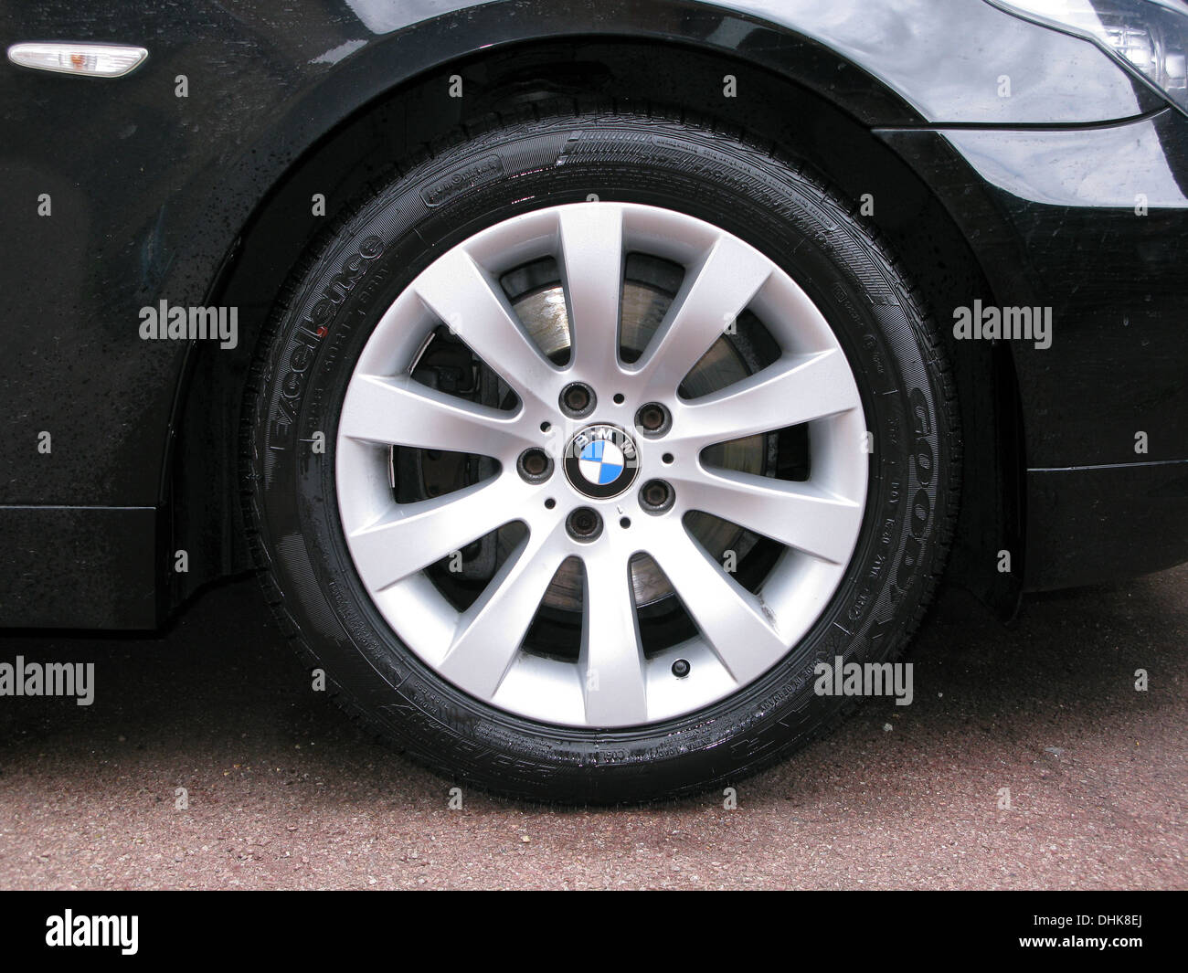 New tire on a BMW alloy wheel Stock Photo - Alamy